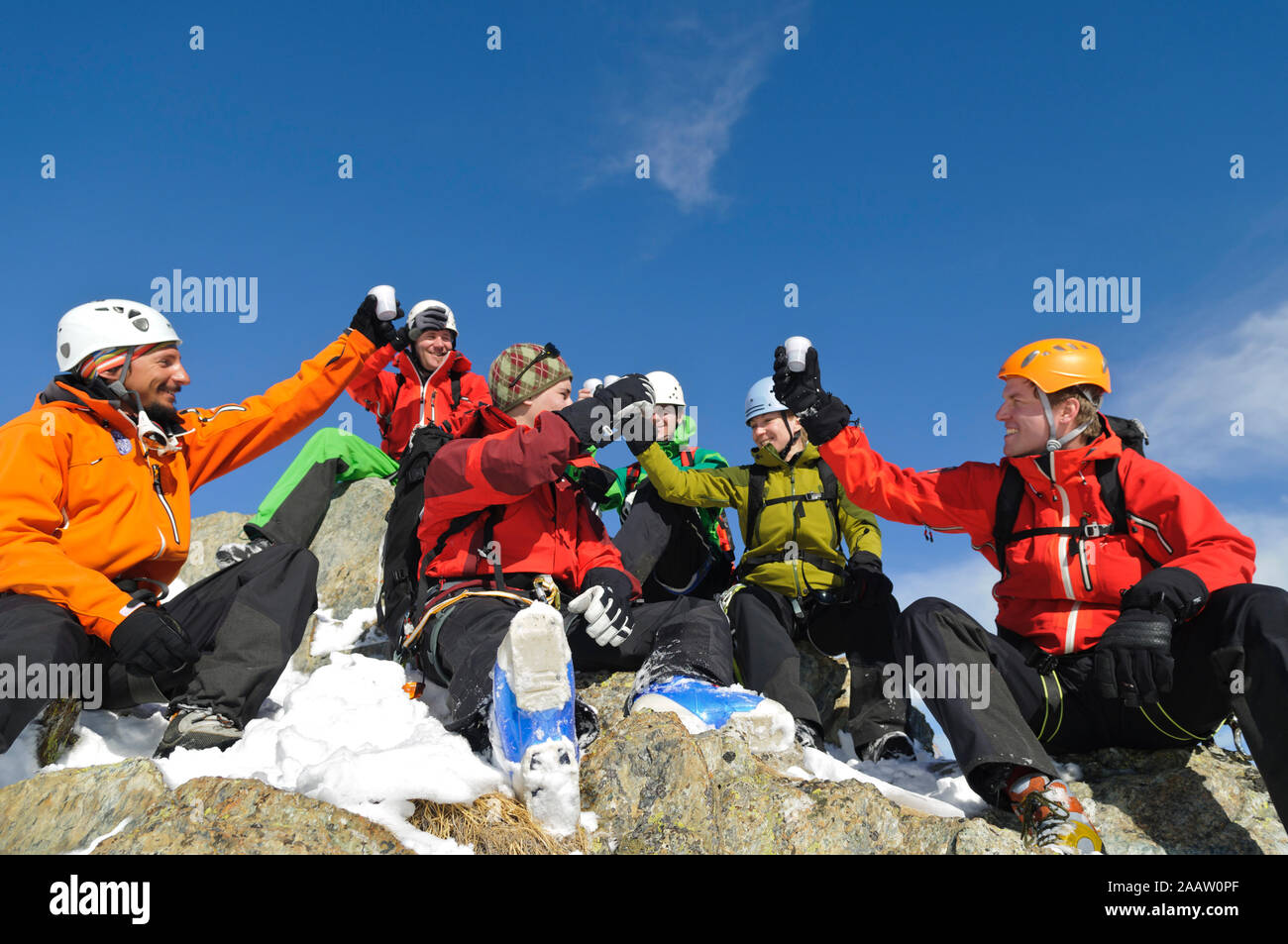 Rope team ascending to mountain top in high alpine region of Monte Rosa ...