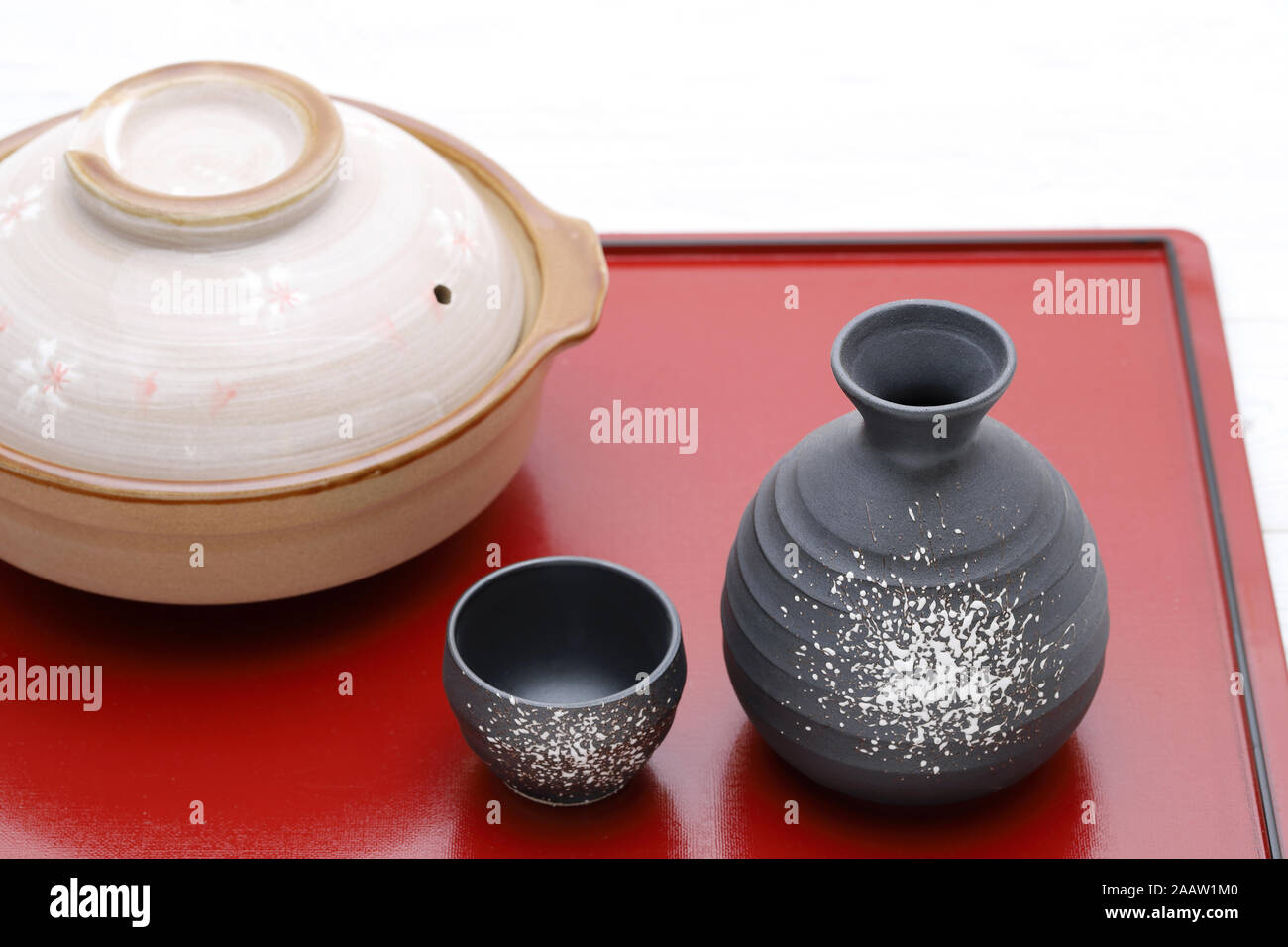 Japanese traditional sake cup and bottle on white background Stock ...