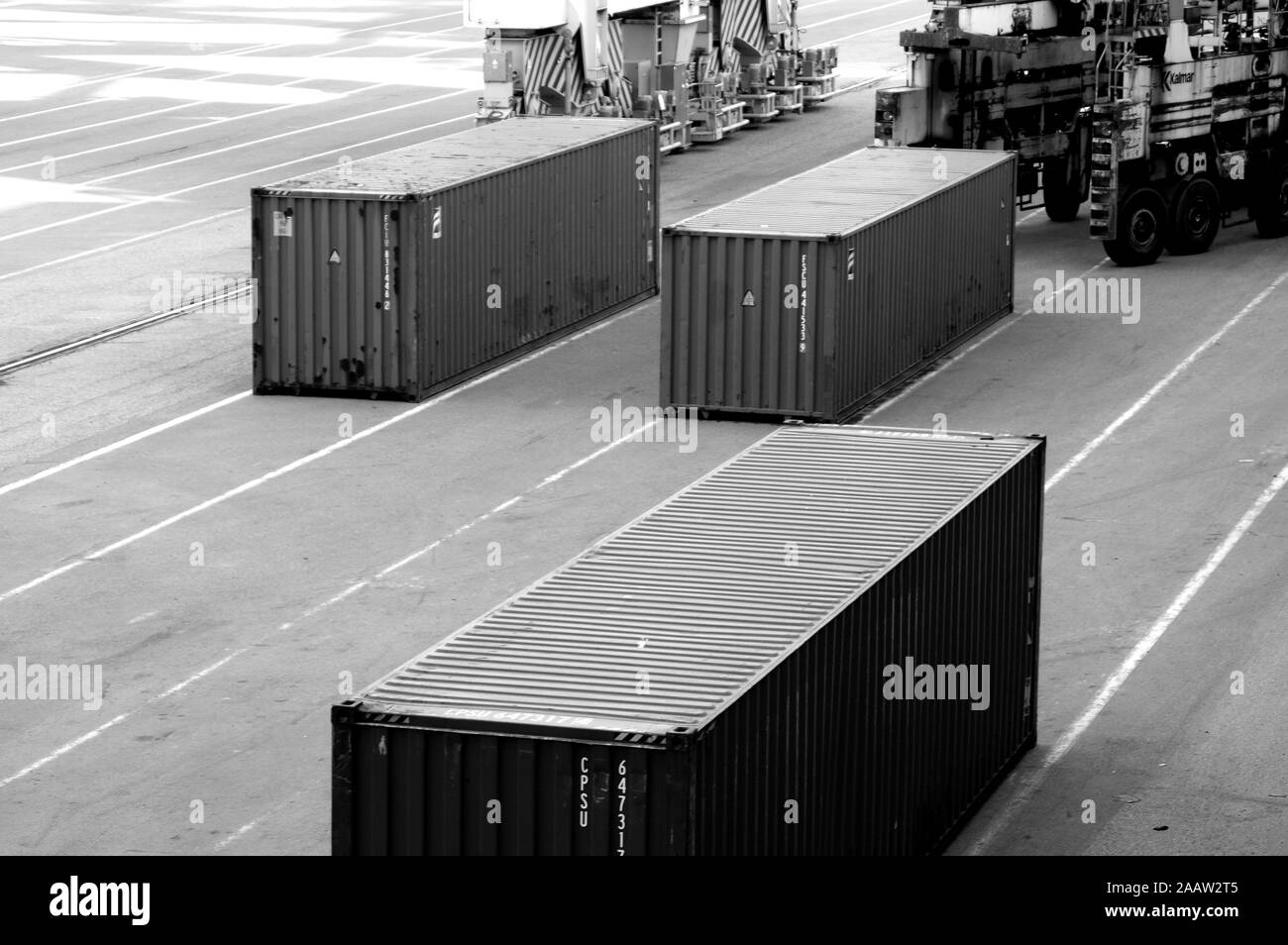 Freight shipping containers at the docks Stock Photo - Alamy