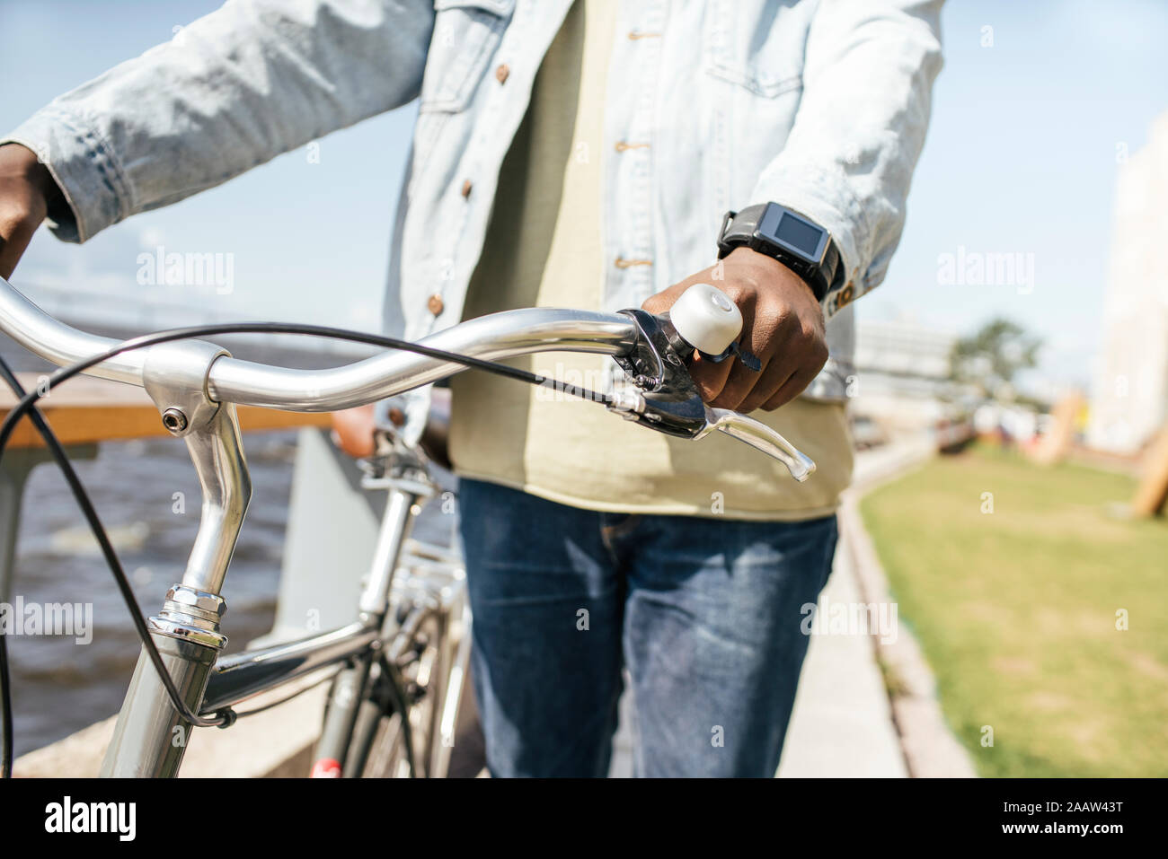 Pushing bike bicycle hi-res stock photography and images - Alamy