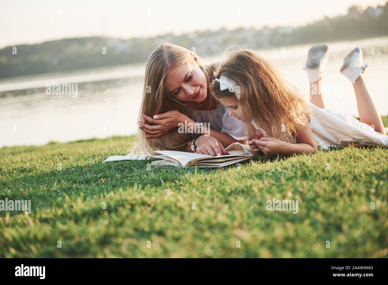 Mother teach child write hi-res stock photography and images - Alamy