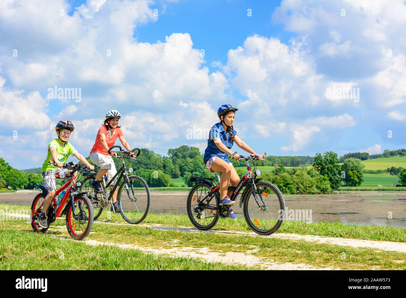 Group of kids biking hi-res stock photography and images - Alamy