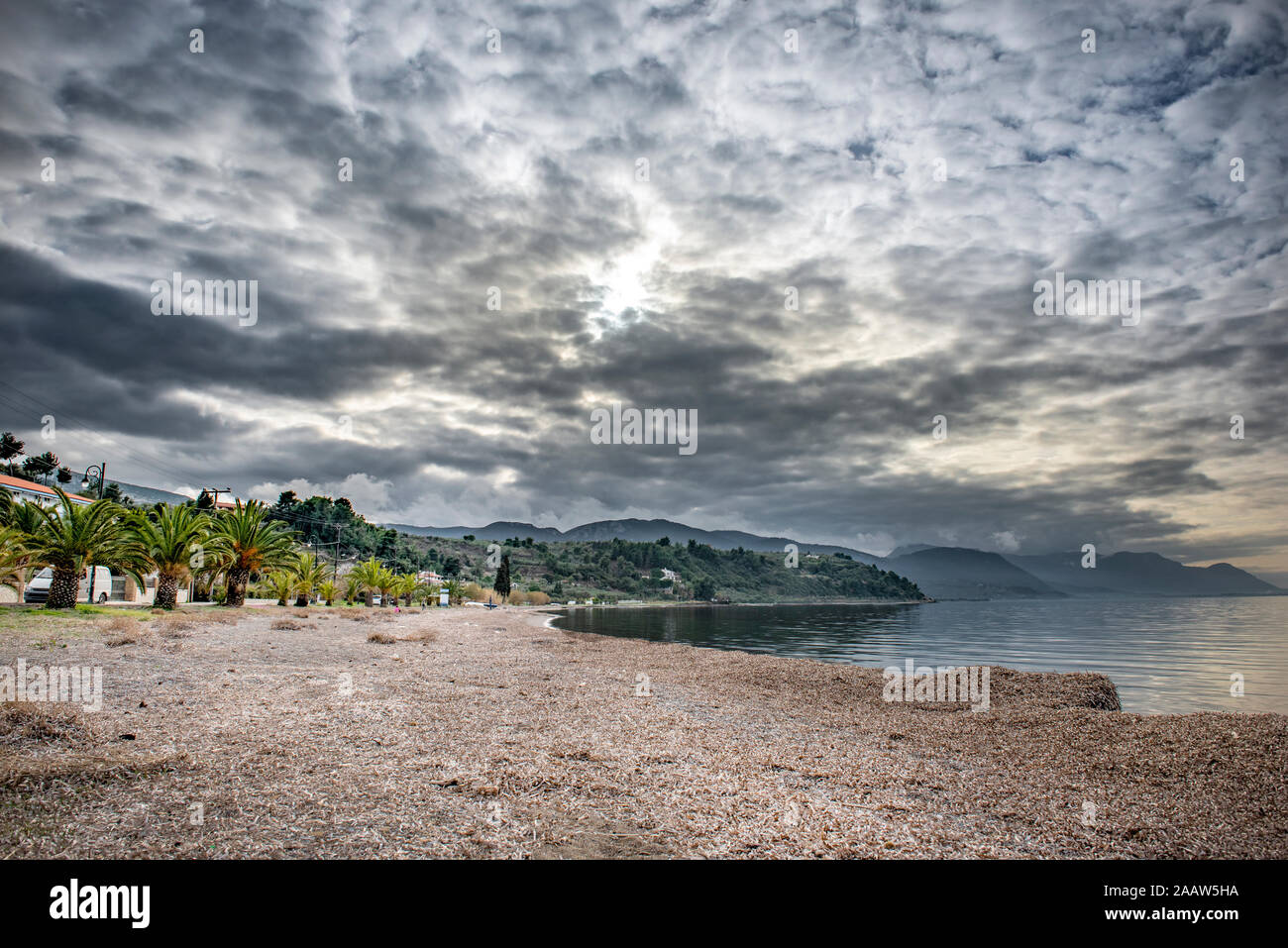 Sunset.View of the beach in Arkitsa under a dramatic cloudscape Stock ...