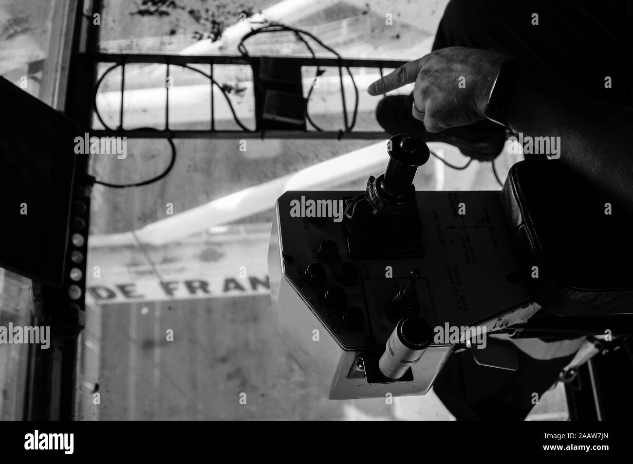 Gantry crane operator moving a sea container in the Port Stock Photo ...
