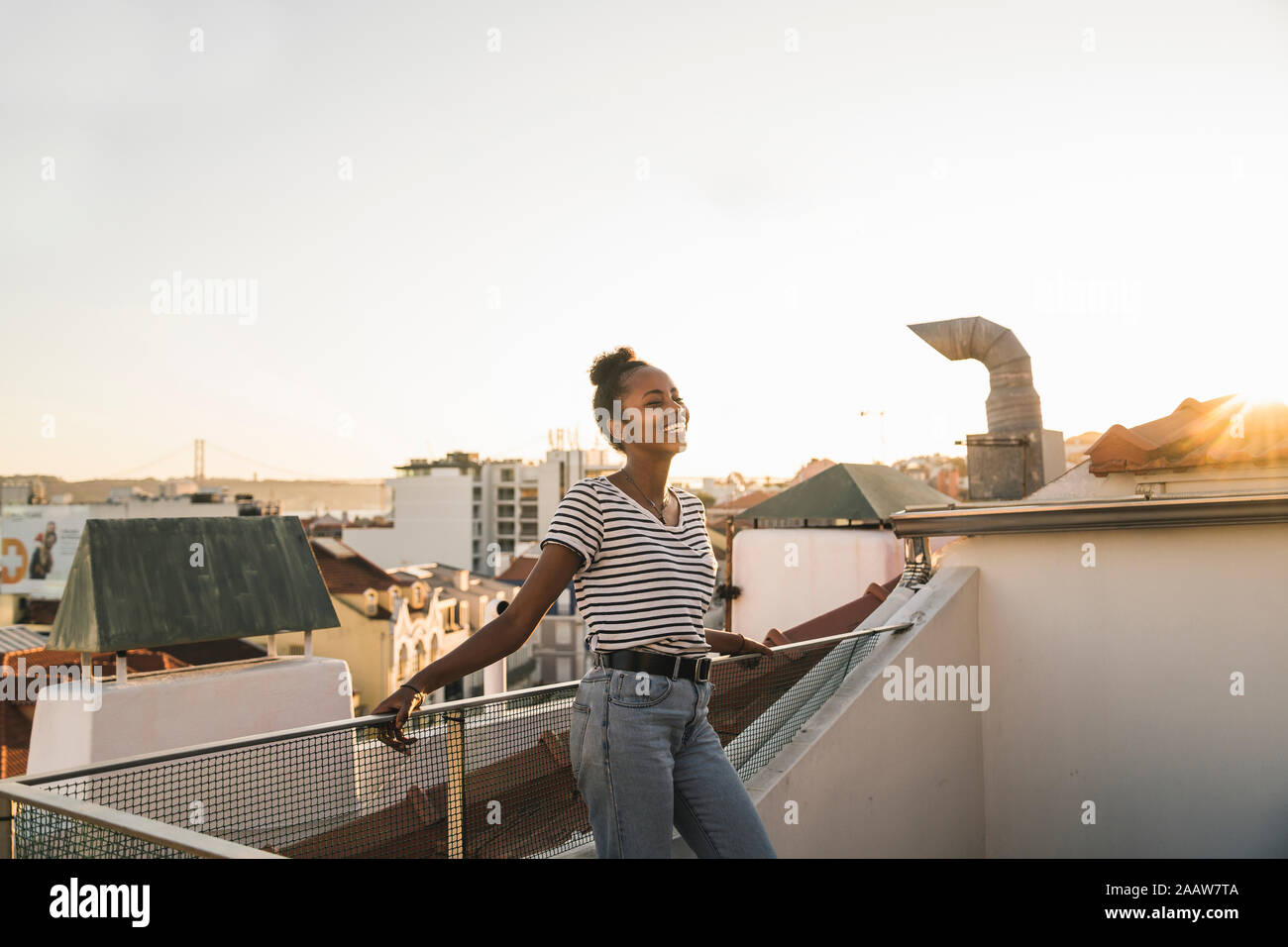 Woman backlit balcony hi-res stock photography and images - Alamy
