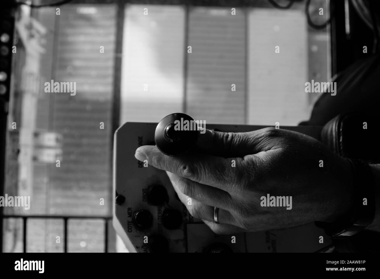 Gantry crane operator moving a sea container in the Port Stock Photo ...