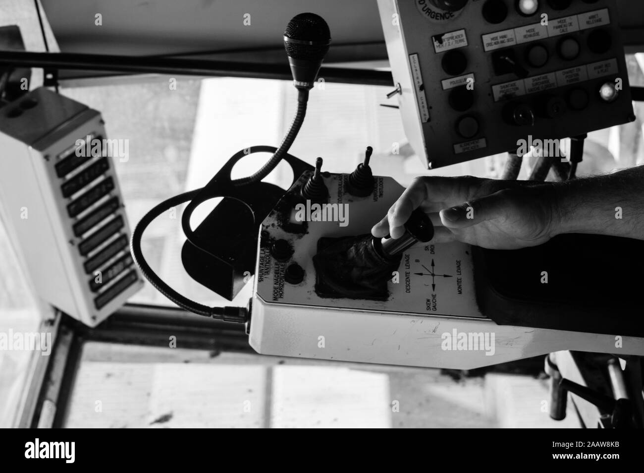 Gantry crane operator moving a sea container in the Port Stock Photo ...