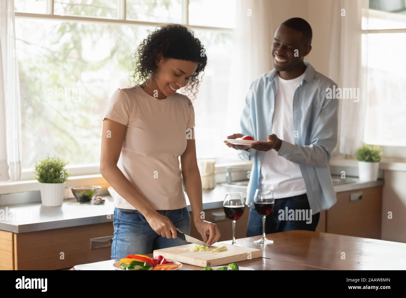Young family relax cooking in kitchen together Stock Photo - Alamy