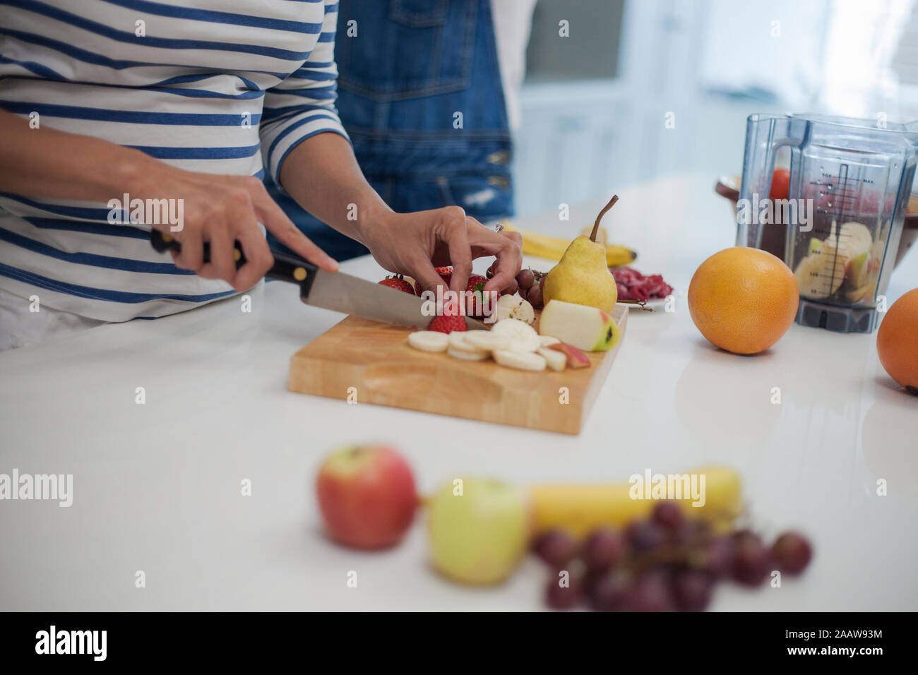 Adult asian woman chopping hi-res stock photography and images - Alamy