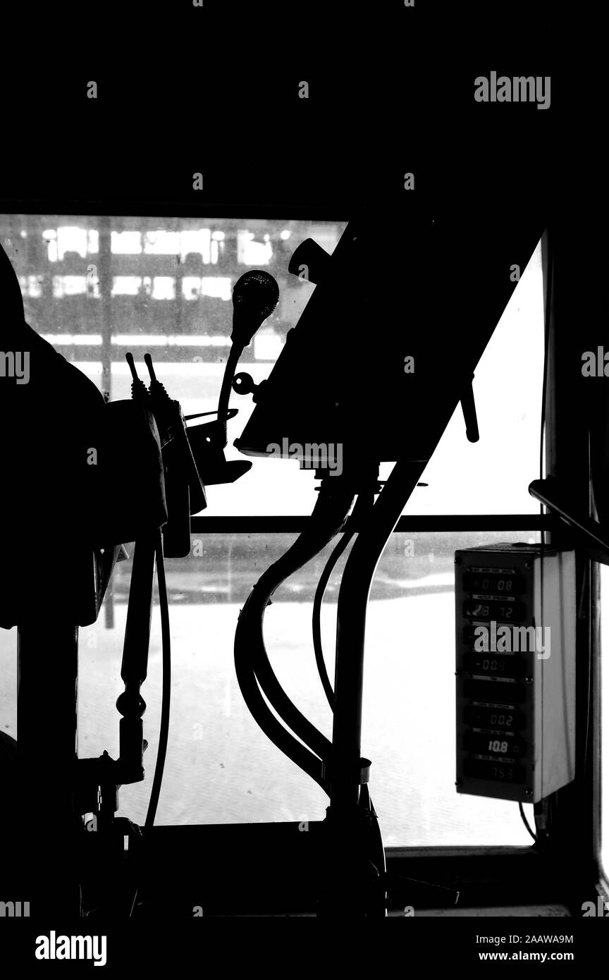 Gantry crane operator moving a sea container in the Port Stock Photo ...