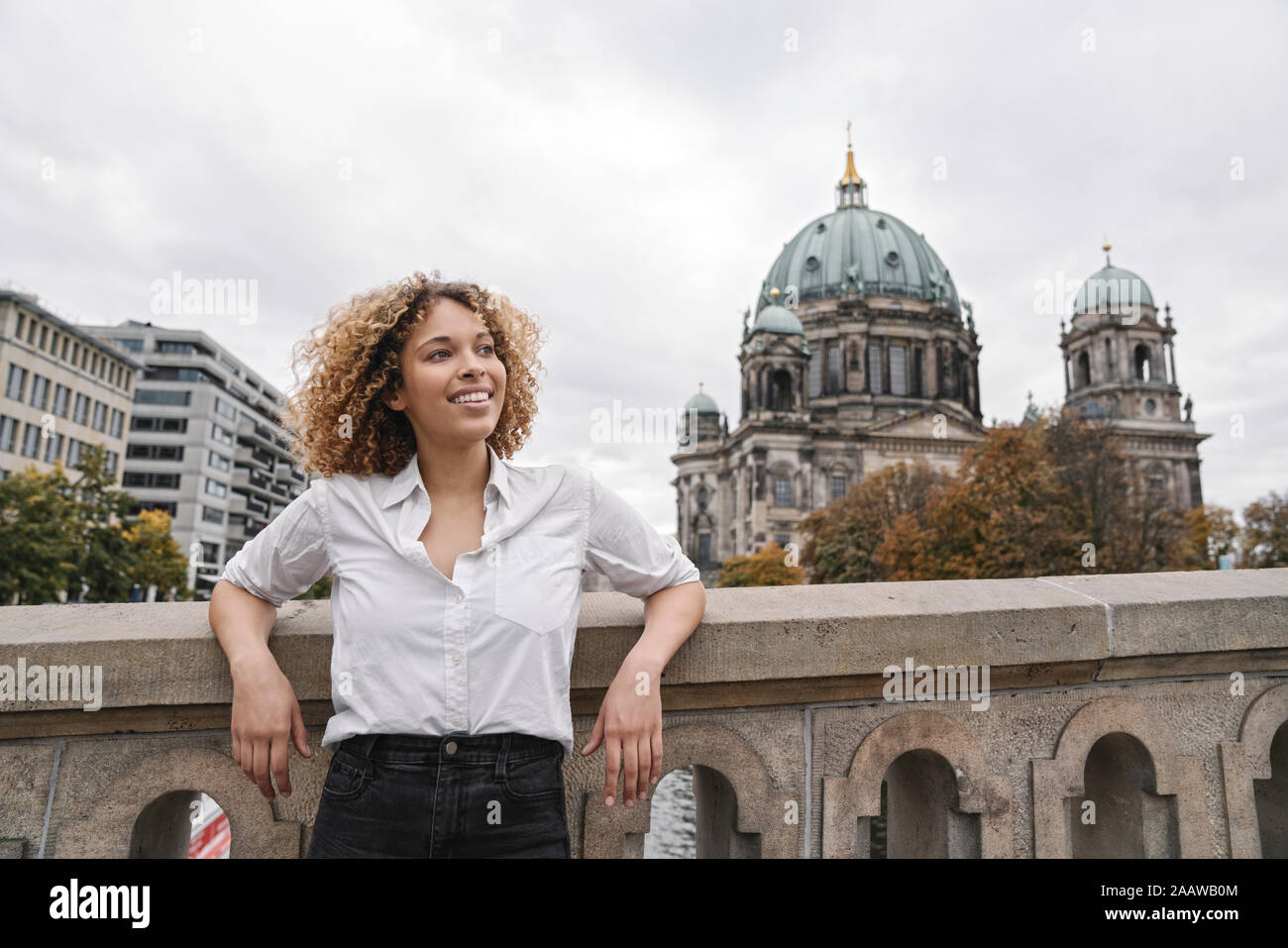 Tourist woman in the city with Berlin Cathedral in background, Berlin ...