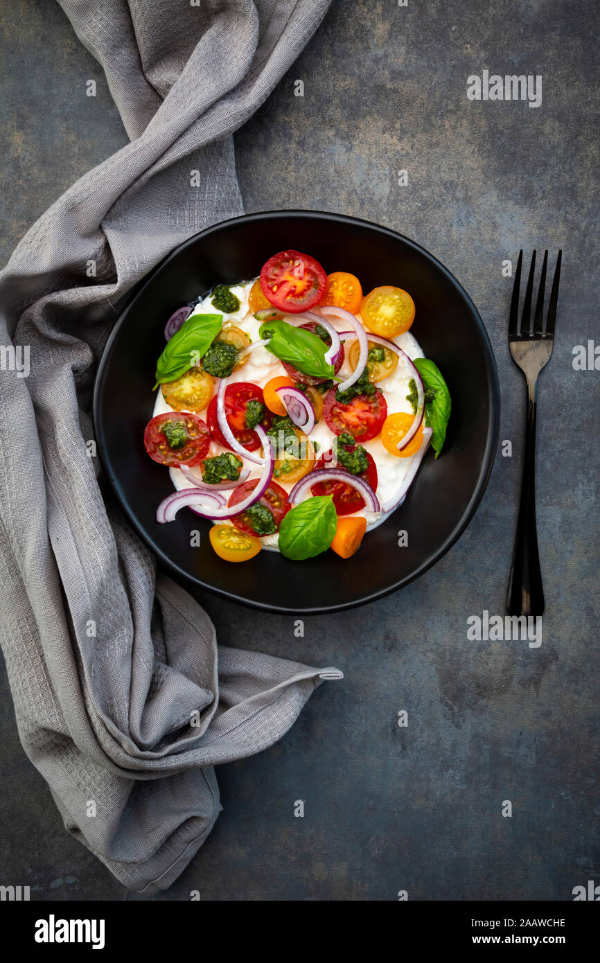 Cottage cheese with colorful cocktail tomatoes, red onion and pesto ...