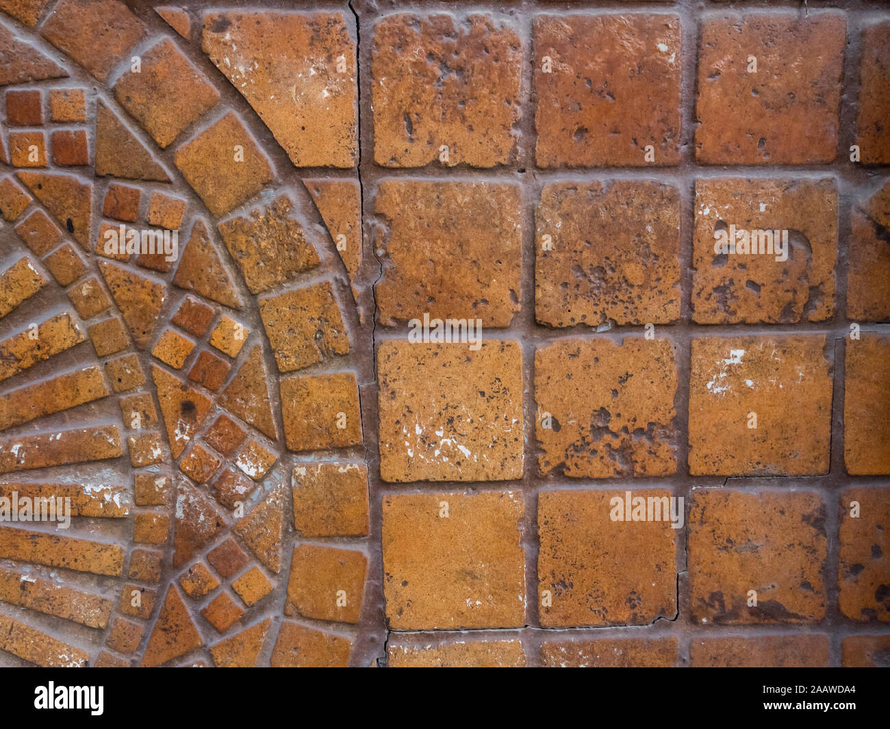Fragment of brown textured pedestrian cobblestone pavement with pattern ...