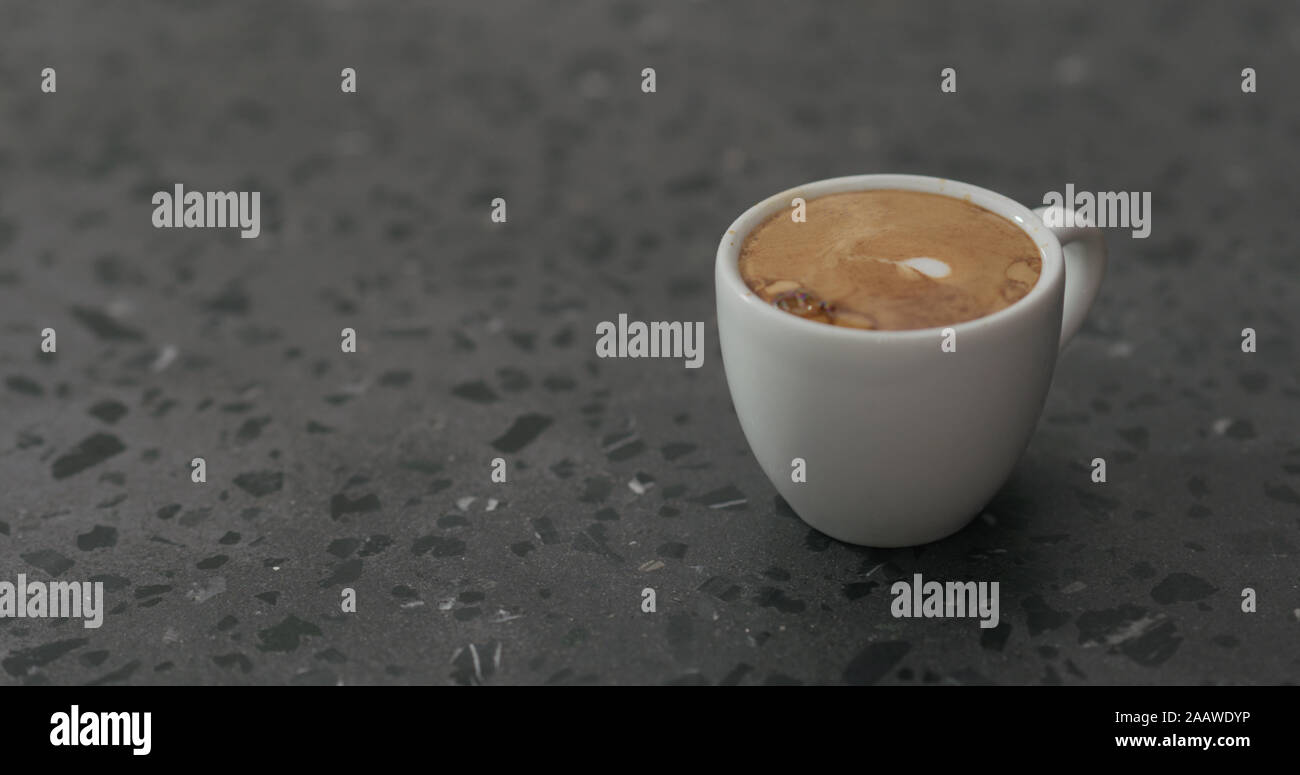 espresso macchiato on terrazzo countertop , wide photo Stock Photo - Alamy