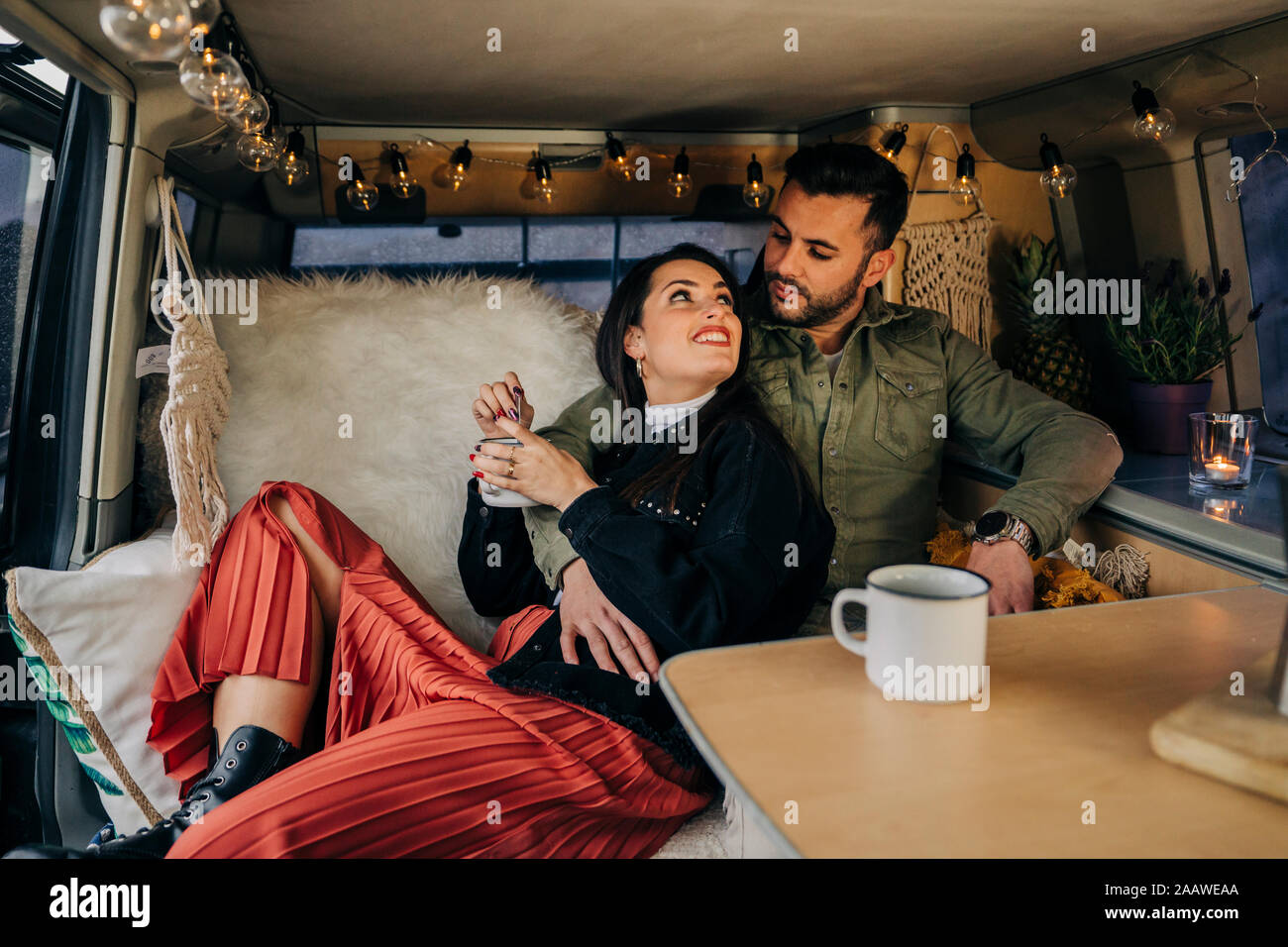 Happy affectionate young couple camper van hi-res stock photography and ...