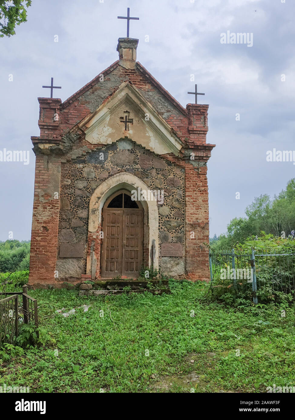 Grave crypt of bricks Ancient red brick crypt grave in an old cemetery ...