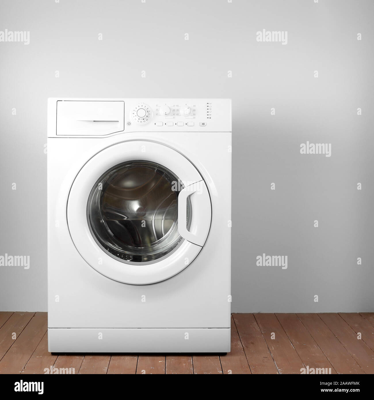 Major appliance - Front view close door washing machine on a white and ...