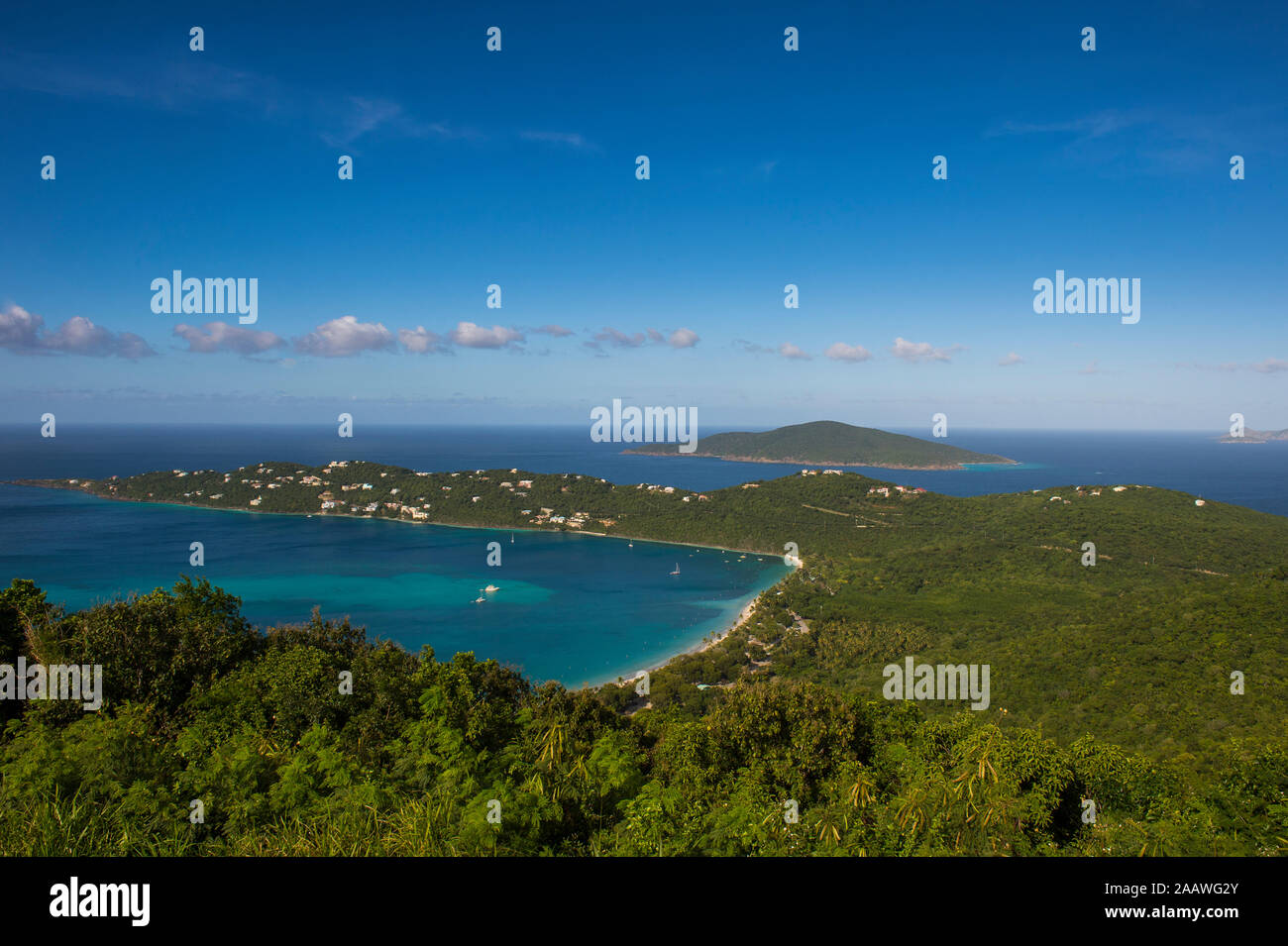 Drone shot of St. Thomas island against blue sky during sunny day, US ...