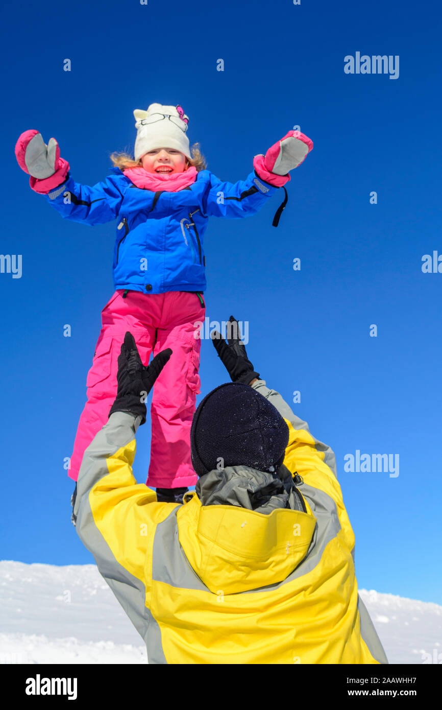 Funny afternoon in wintertime on sleigh slope Stock Photo - Alamy