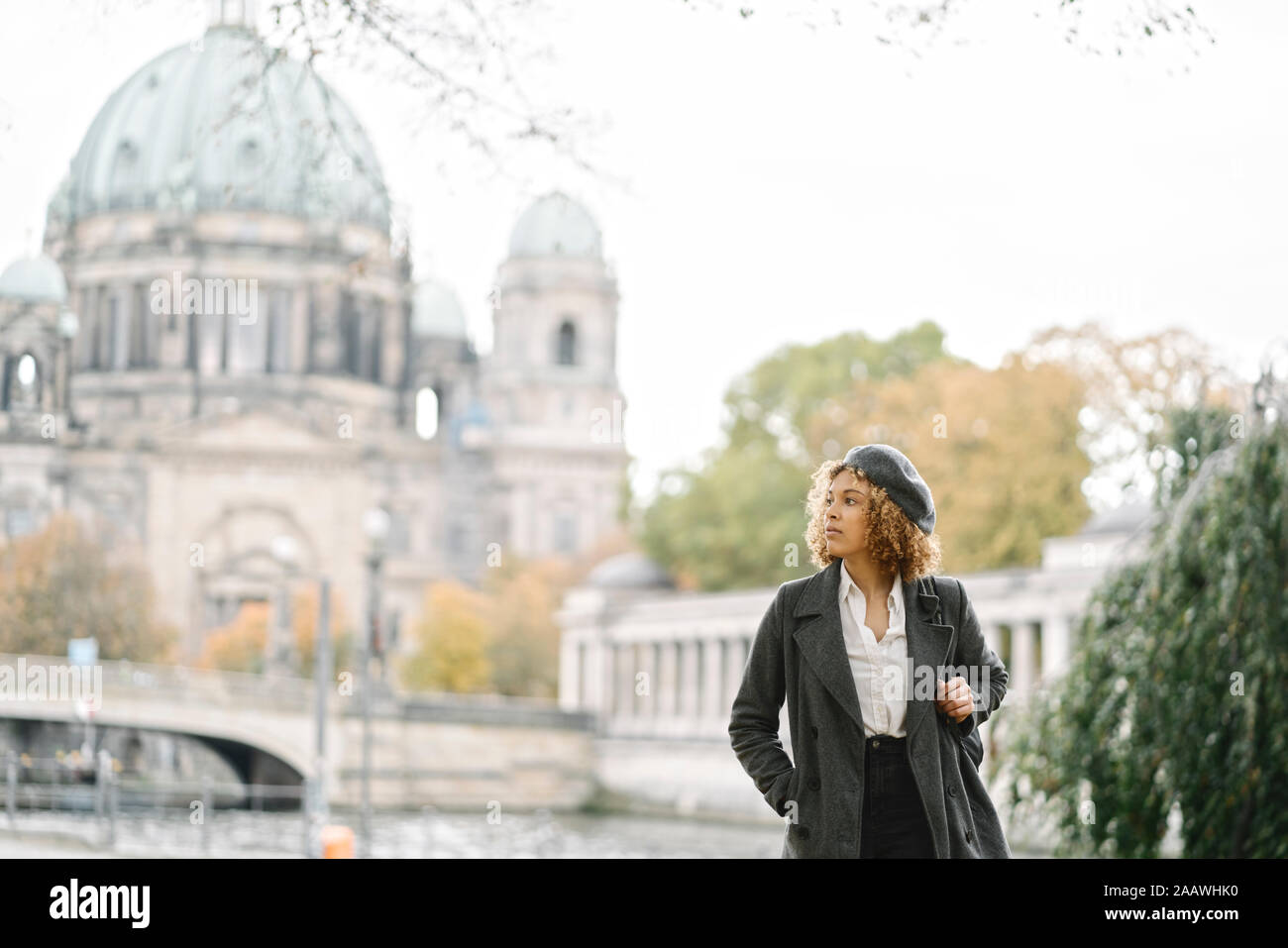 Tourist woman in the city with Berlin Cathedral in background, Berlin ...