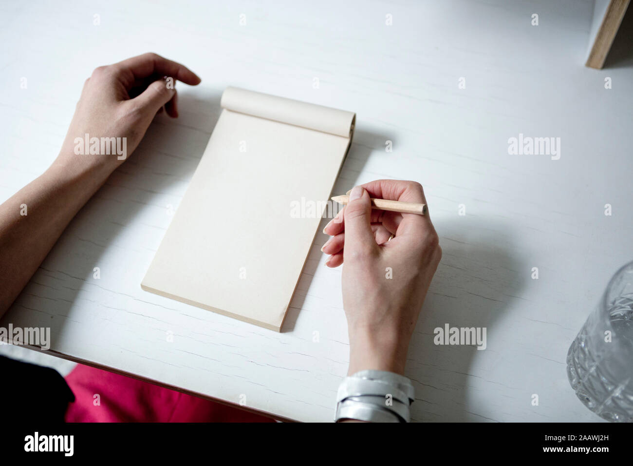 Tabletop view woman hand hi-res stock photography and images - Alamy