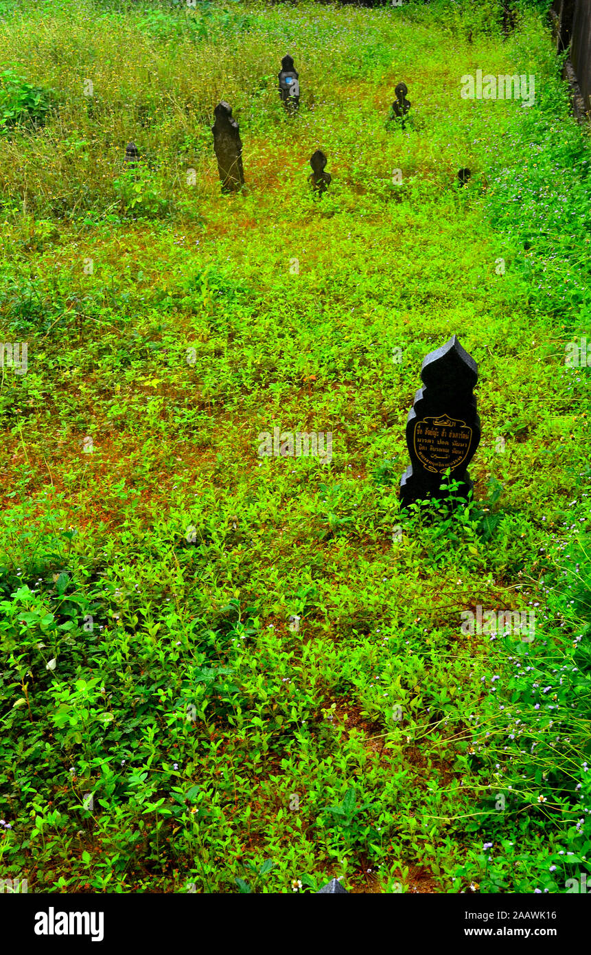 A Muslim cemetary with gravestones in Kamala Beach, Phuket Thailand ...