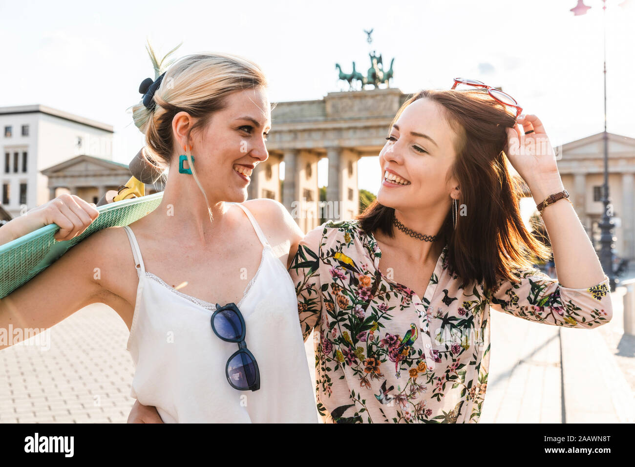 Portrait of two best friends in front of Brandenburger Tor, Berlin ...