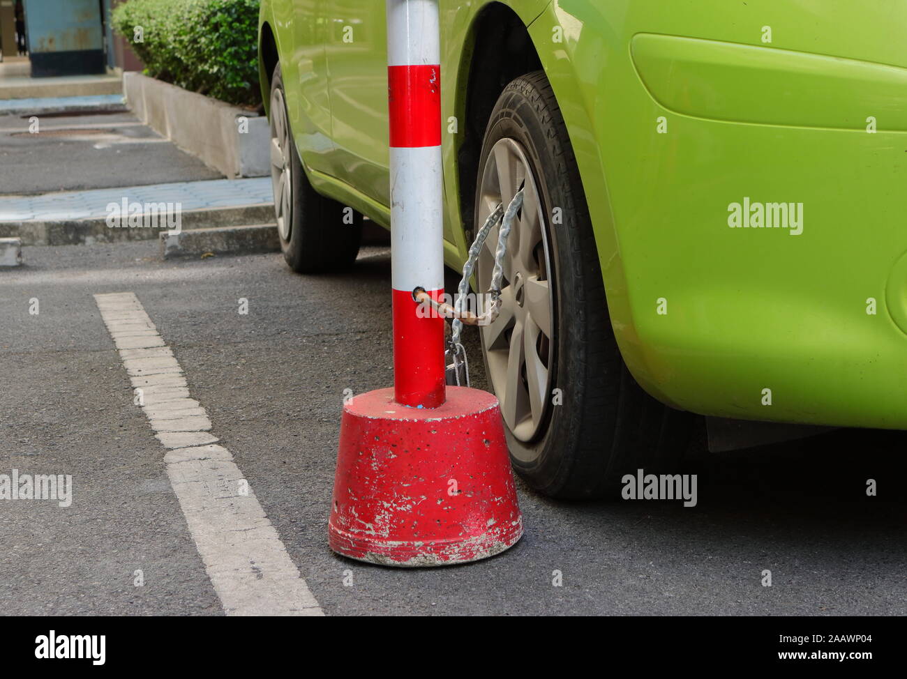The wheel is fastened to wheel clamp made from chain and padlock ...
