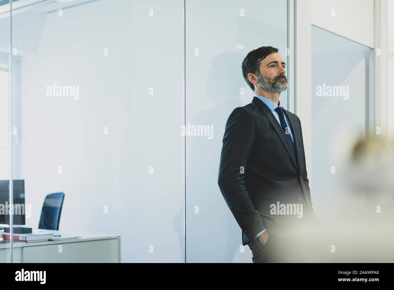 Tired businessman in black suit hi-res stock photography and images - Alamy