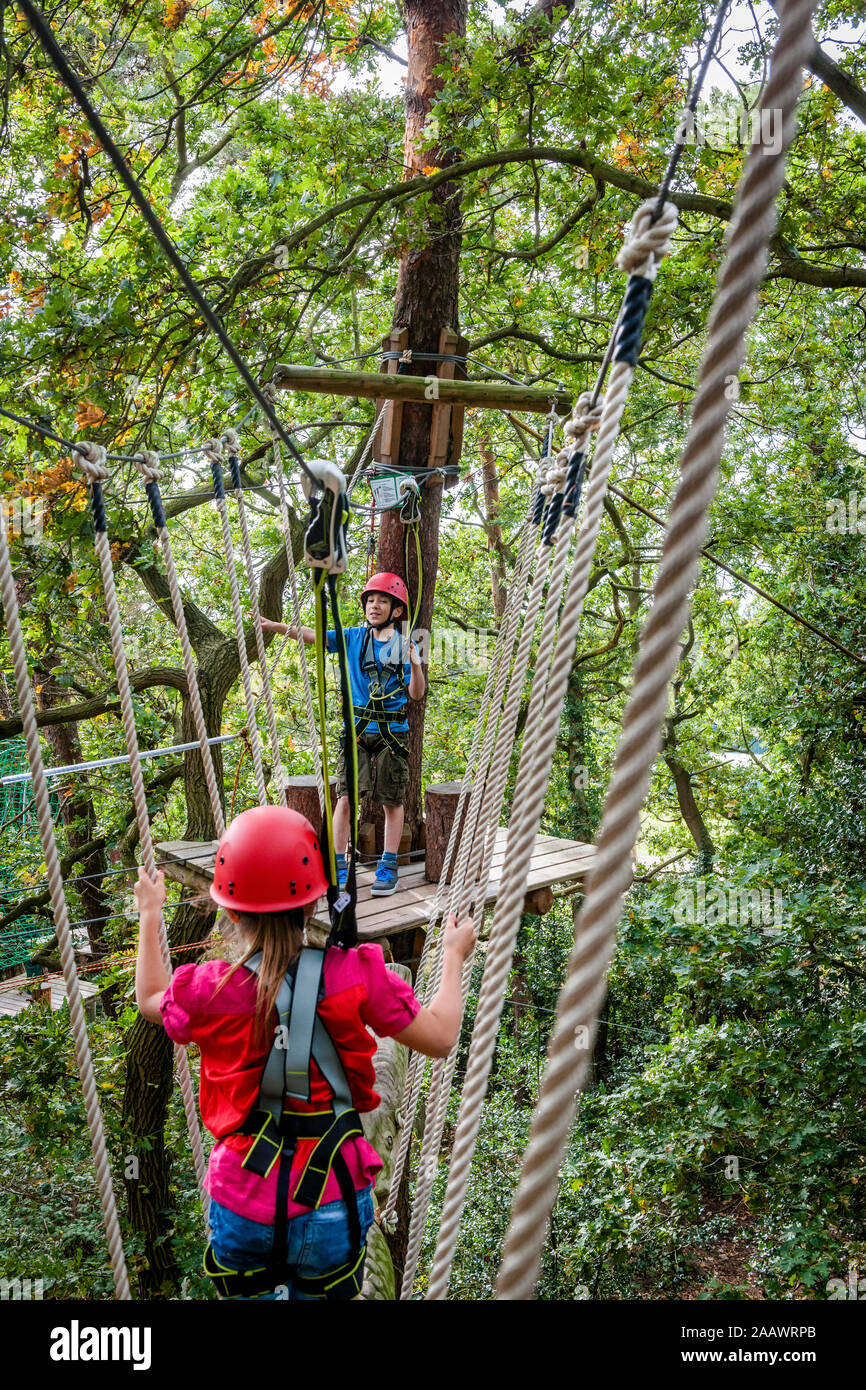 Girl balancing on rope hi-res stock photography and images - Alamy
