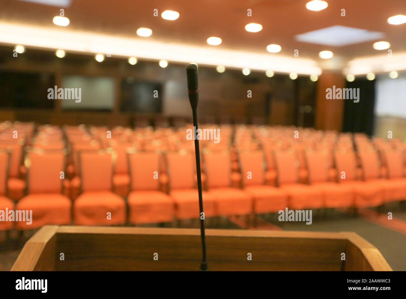 Rostrum with microphone in conference hall Stock Photo - Alamy