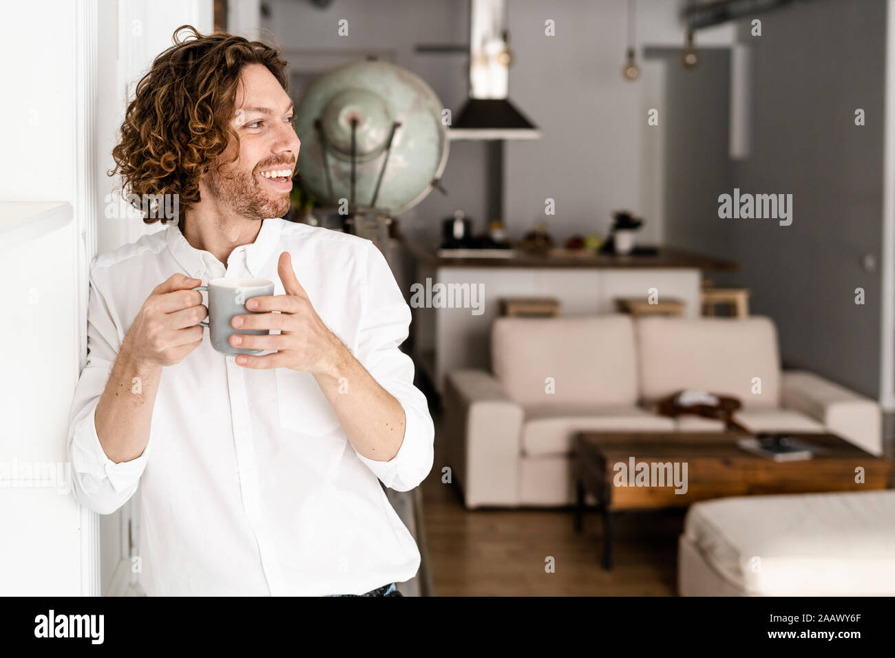 Happy man drinking coffee hi-res stock photography and images - Alamy