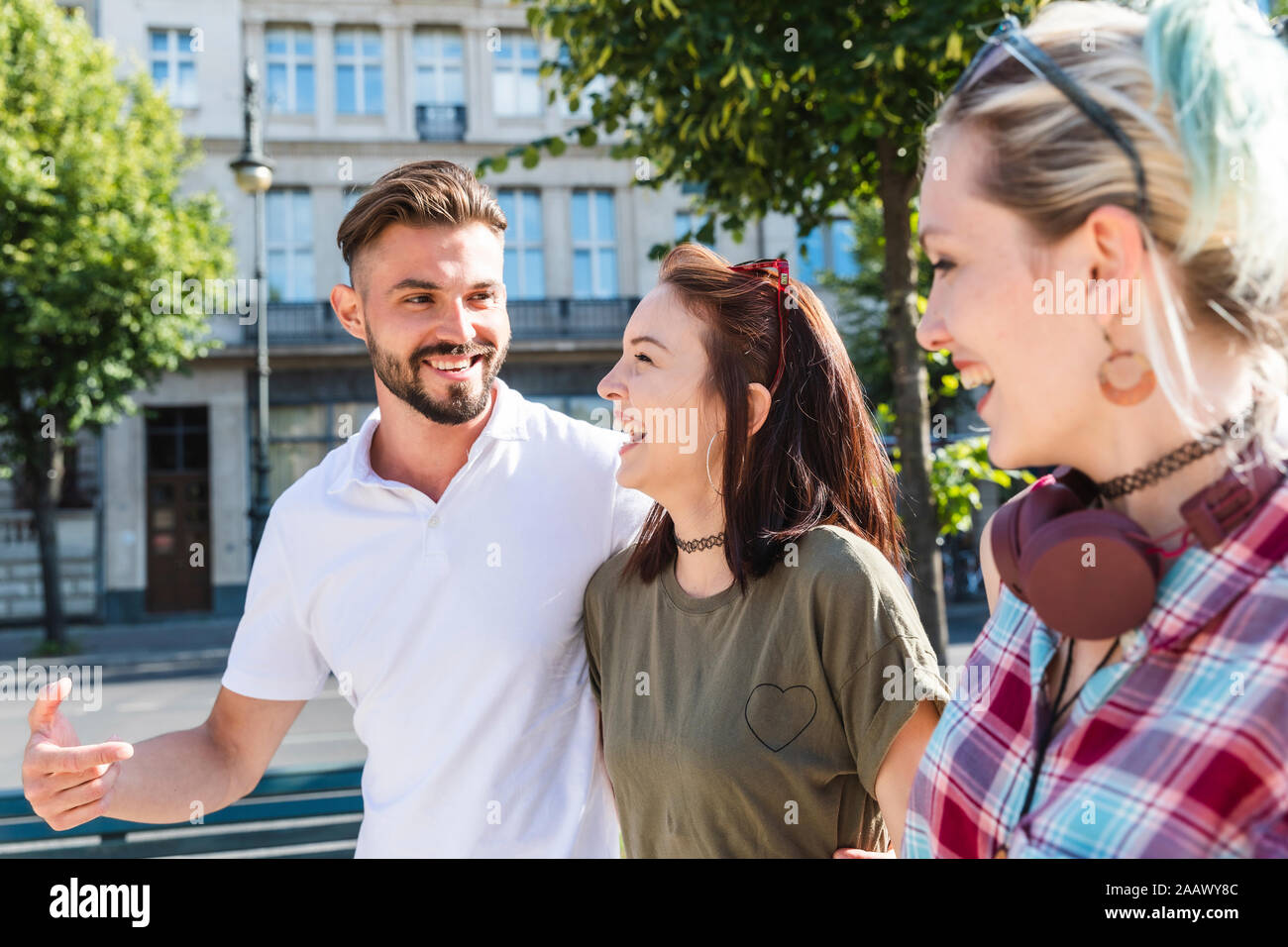 Three friends having fun together Stock Photo - Alamy