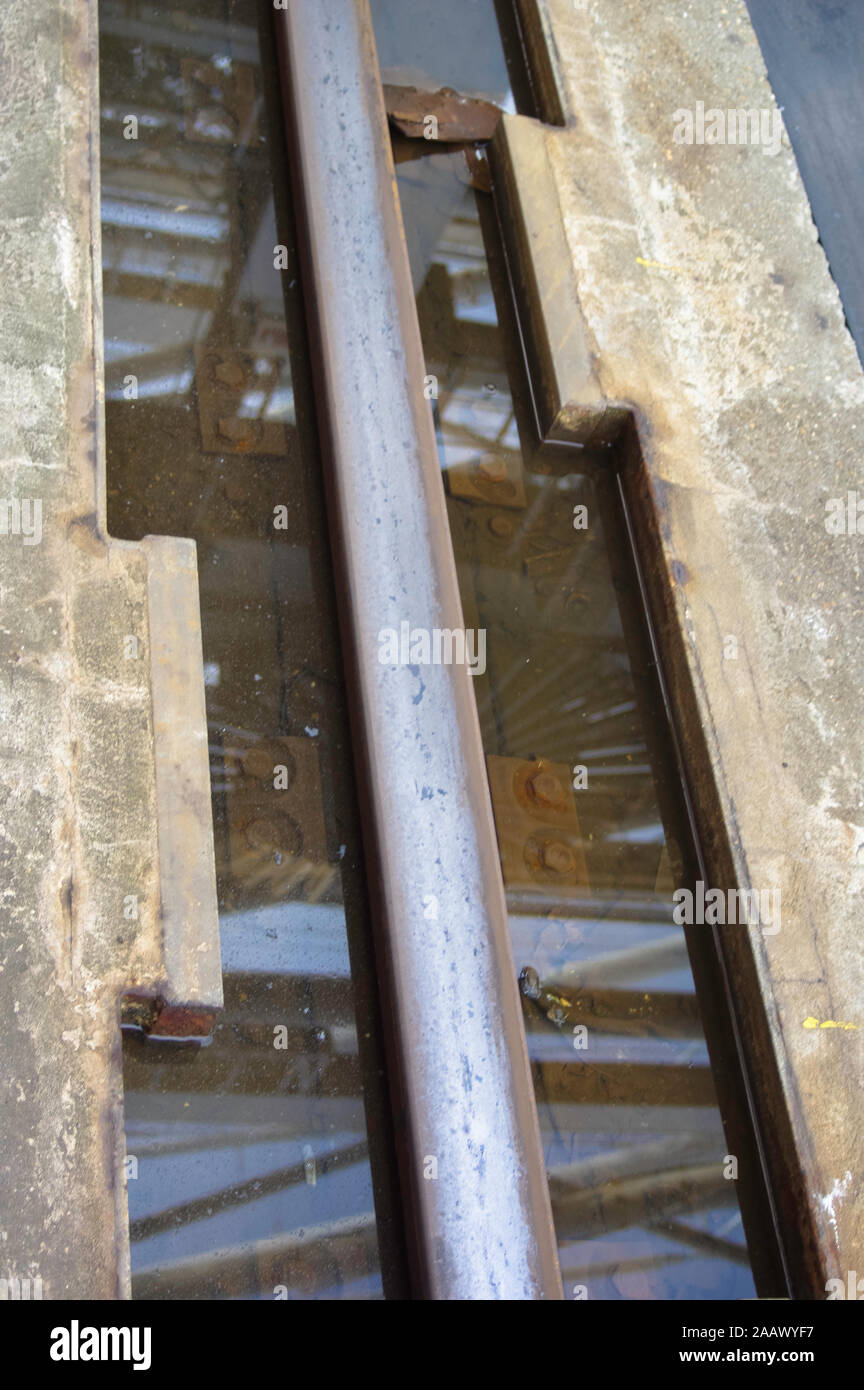 Railway tracks through industrial area Stock Photo - Alamy