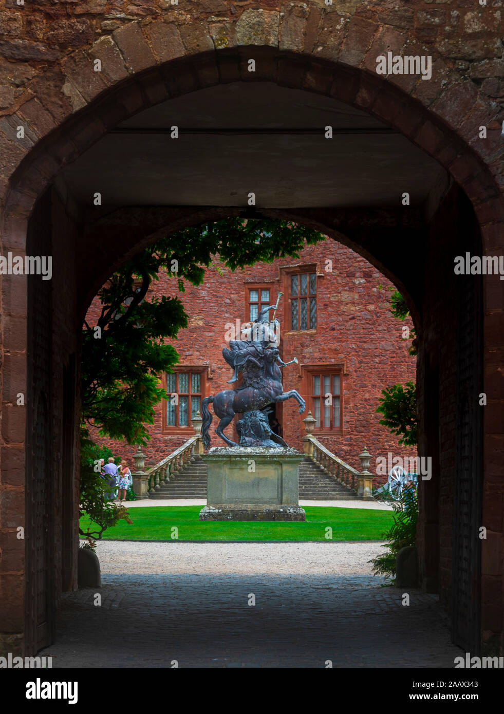 Path, gateway, an entrance through trees and buildings Castle Stock ...