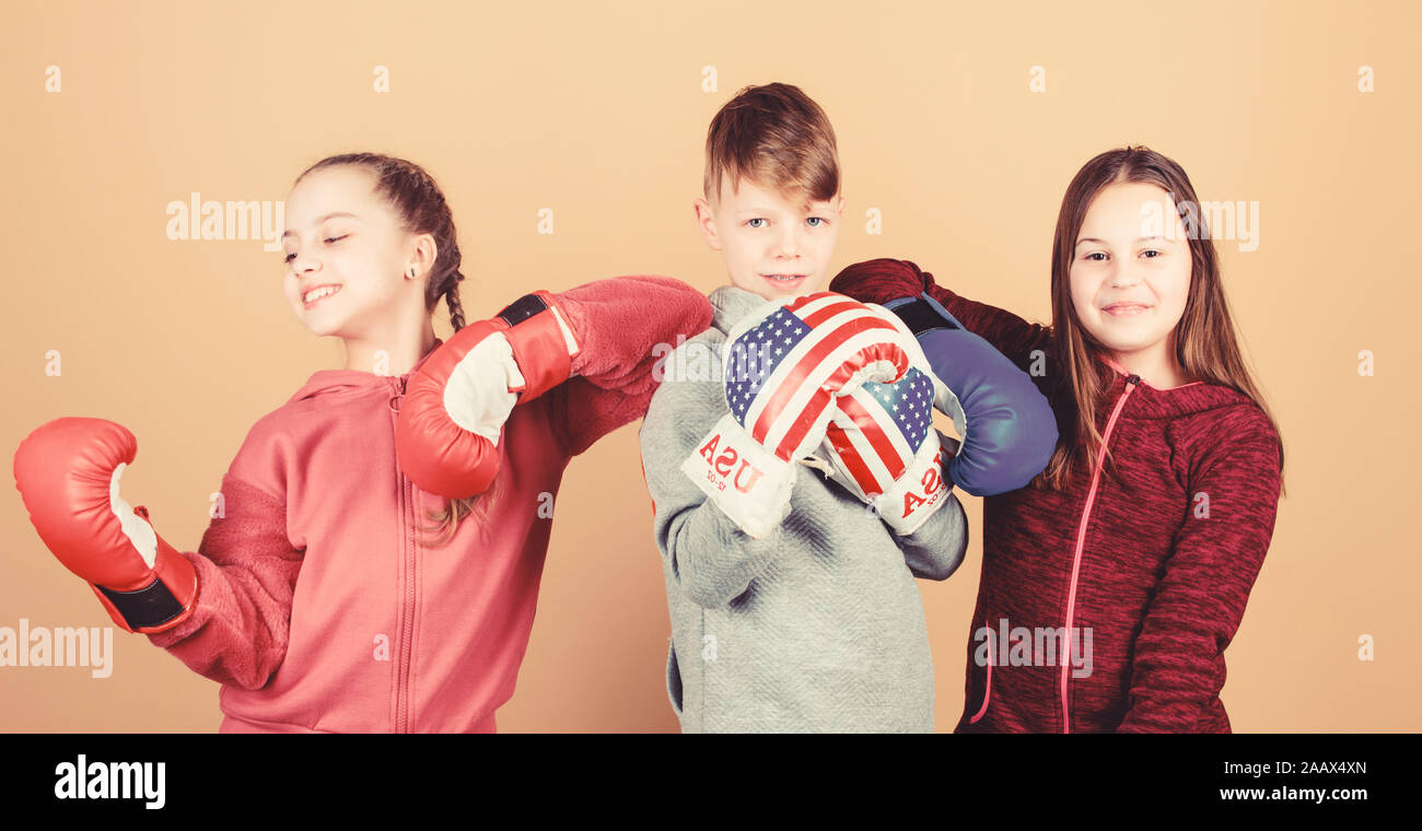 Team fight. Sport success. workout of small girls and boy boxer in ...