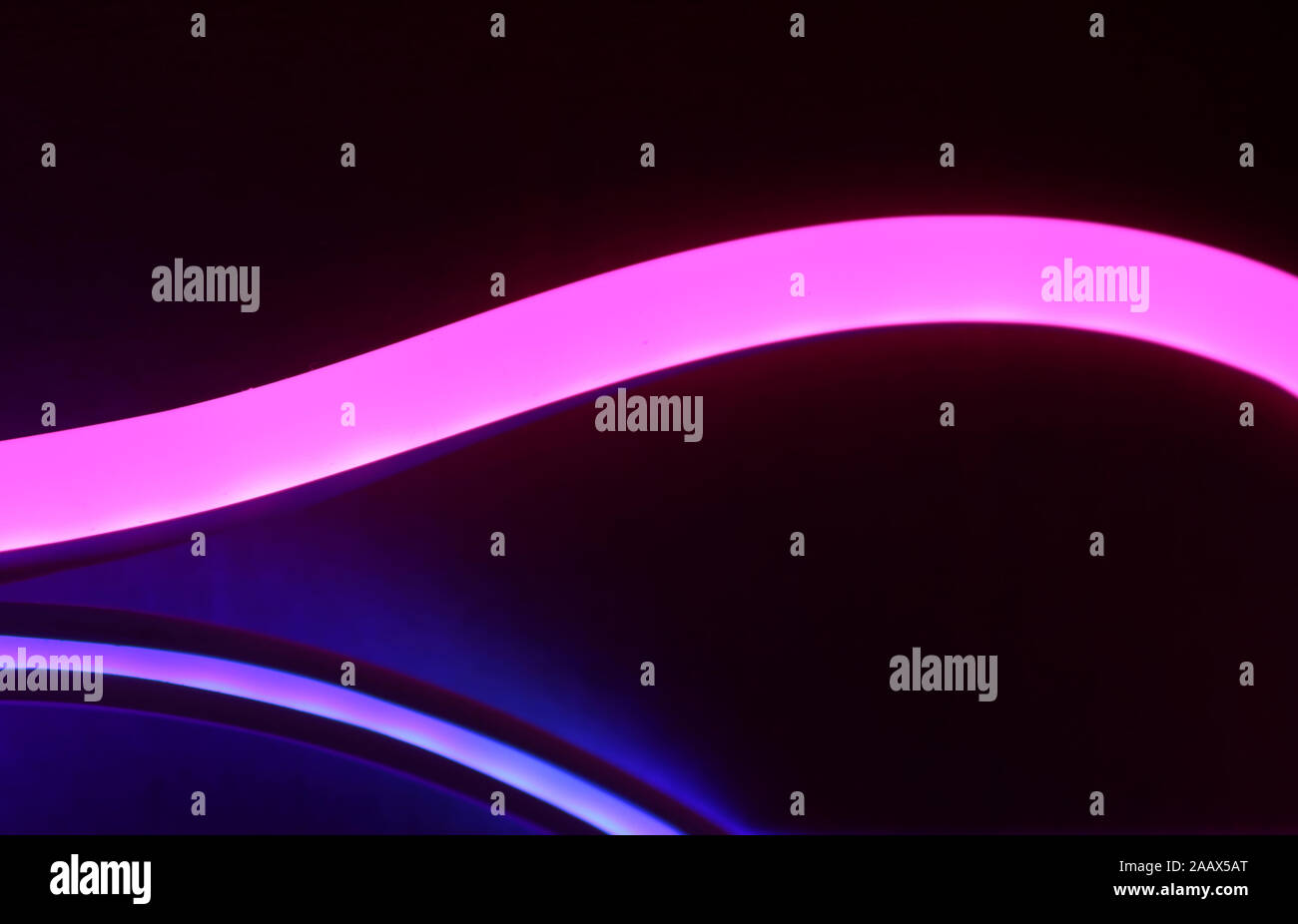 Abstract neon lights in the dark. Pink and blue lights Stock Photo - Alamy