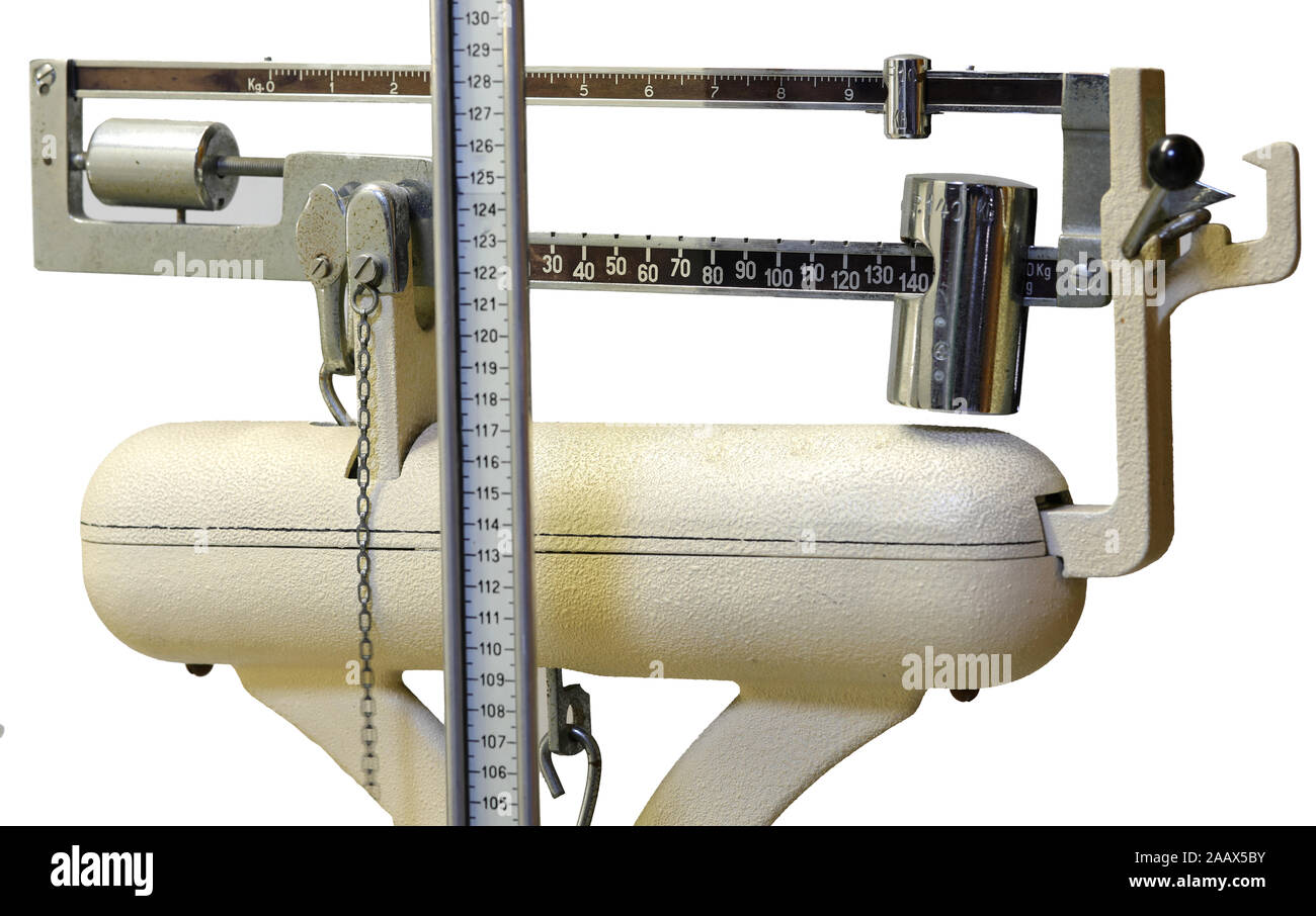 ancient scale for weighing and measuring children during a visit to a ...