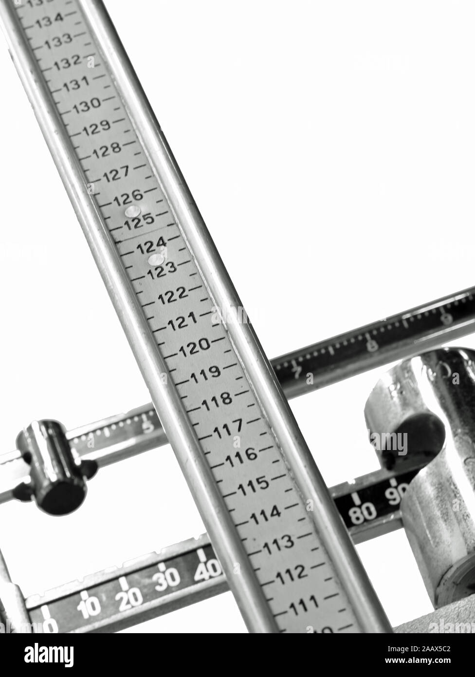 graduated rod of an ancient scale to weigh and measure children during ...