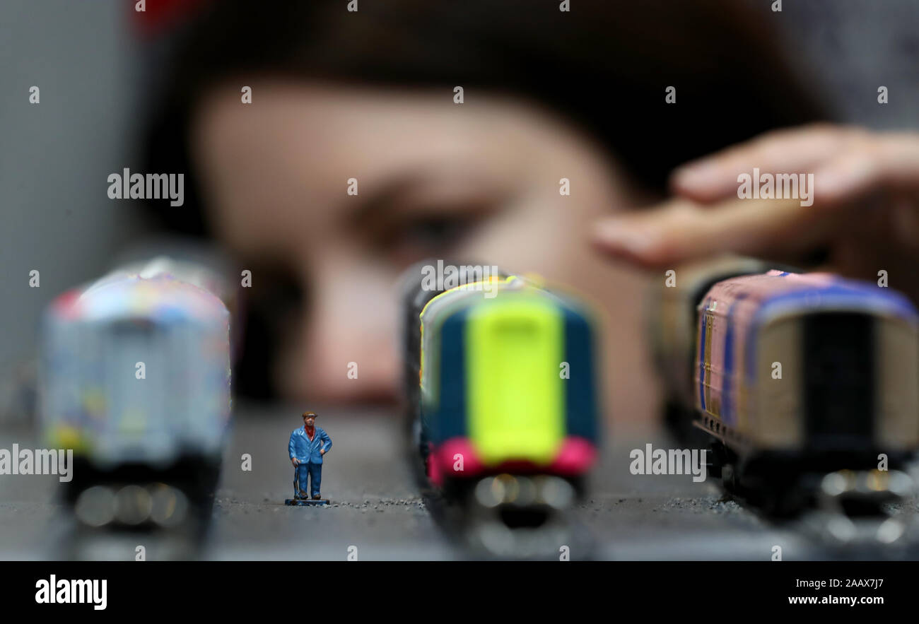 Emily Paxton, co-curator, puts the final touches to Urban Miniatures ...