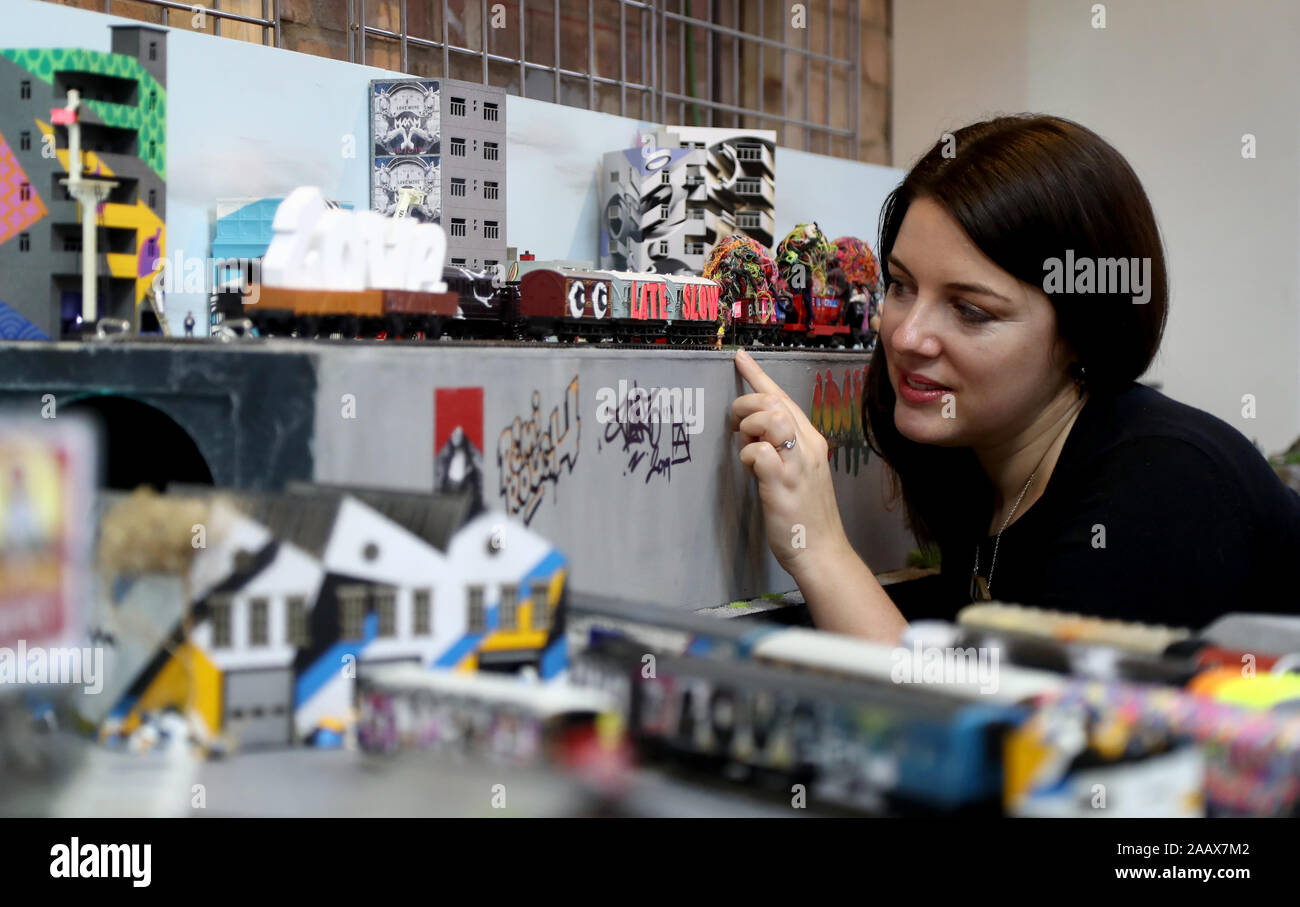 Emily Paxton, co-curator, puts the final touches to Urban Miniatures ...