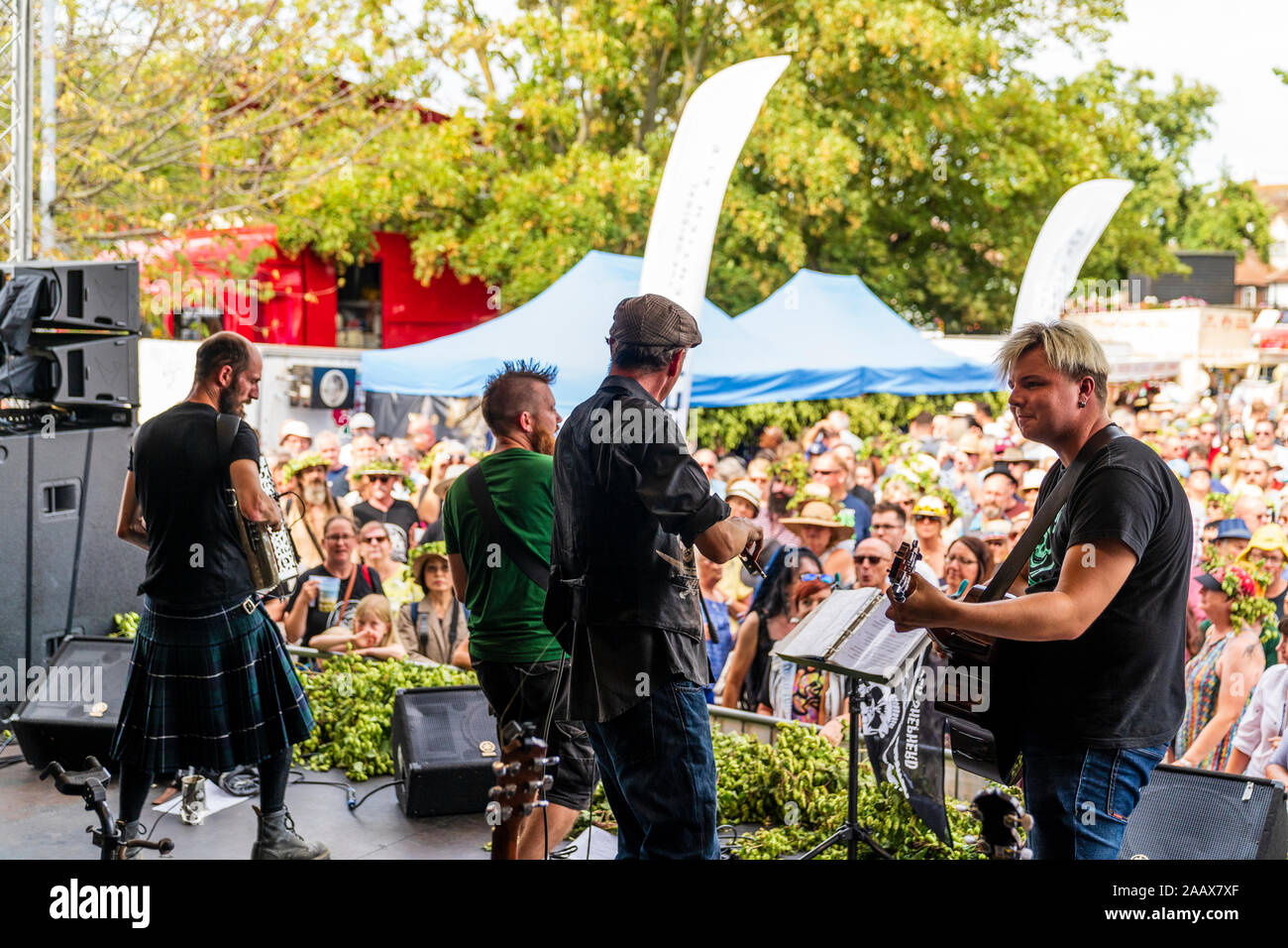 Faversham Hop Festival. Back of stage view of the French rock band 'Sur ...