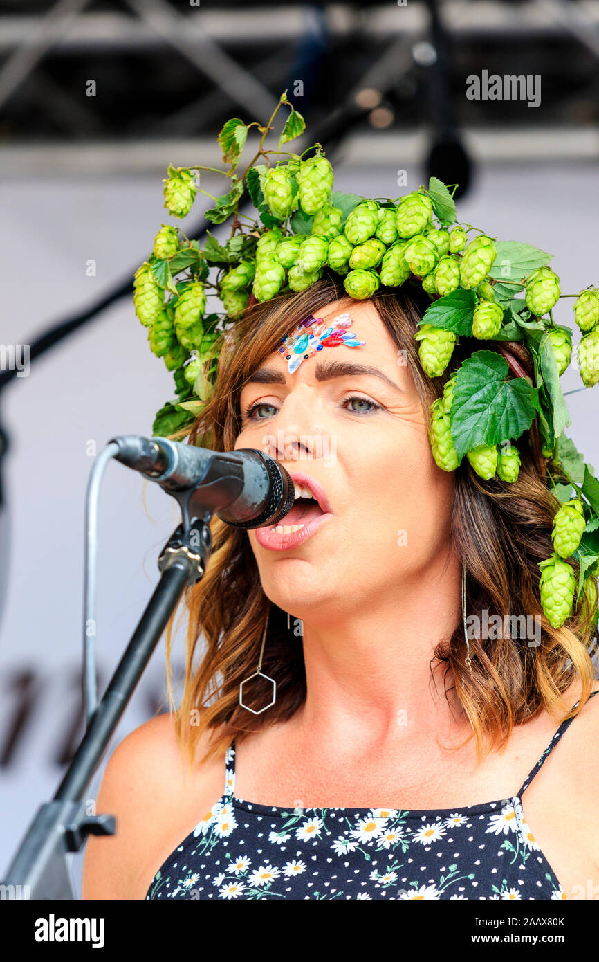 Faversham hop festival. Close up of the female lead singer of Dune ...