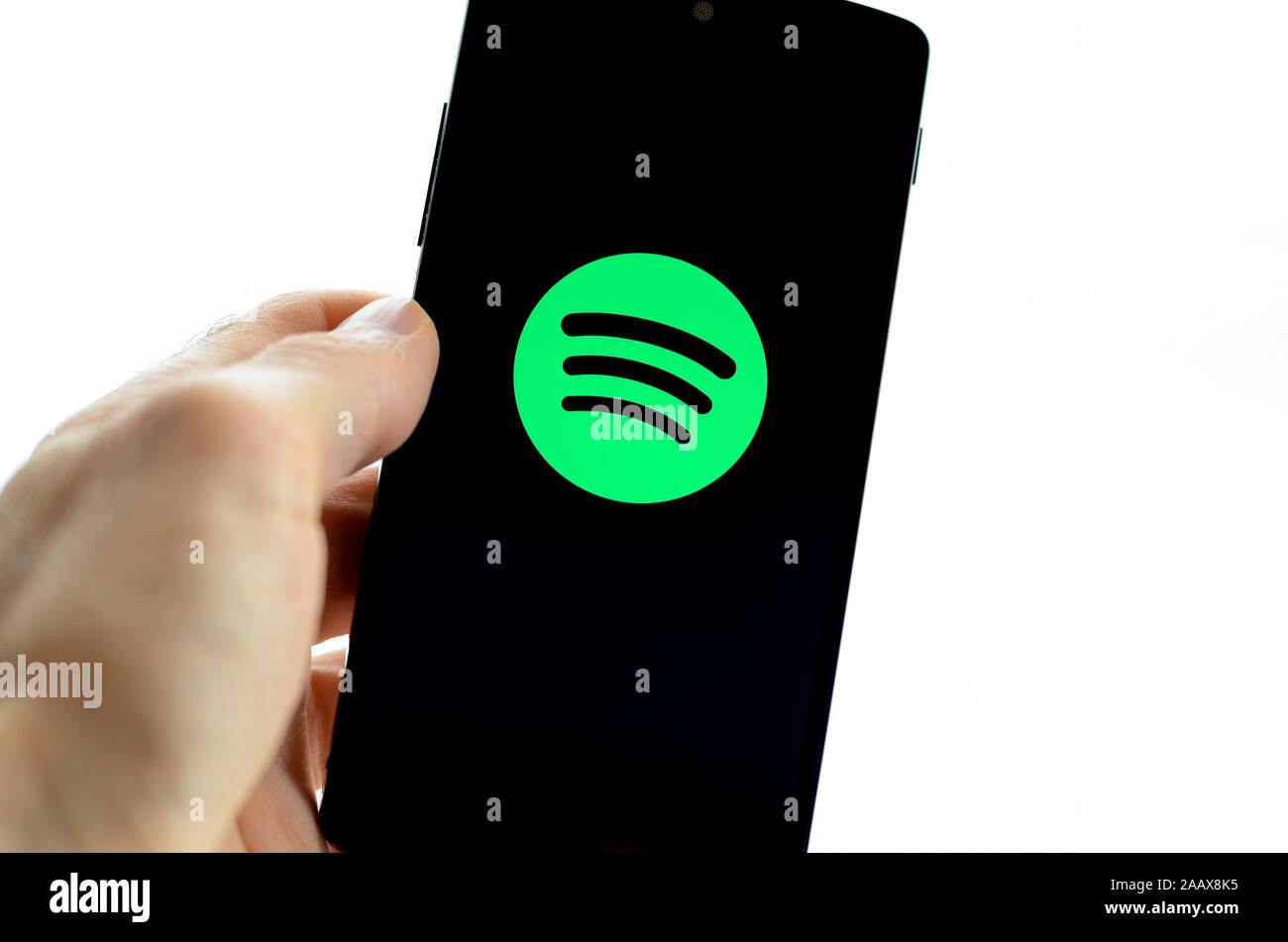 Spotify on phone hi-res stock photography and images - Alamy