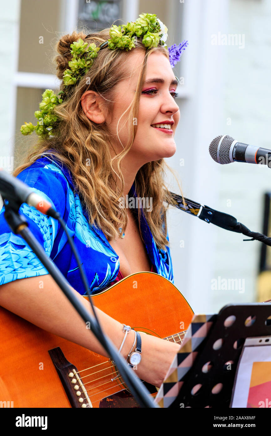 Young woman sings plays acoustic hi-res stock photography and images ...