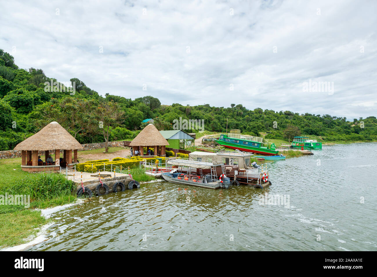 River safari wildlife tours boat station below Myewa Safari Lodge on Kazinga Channel by Lake ...