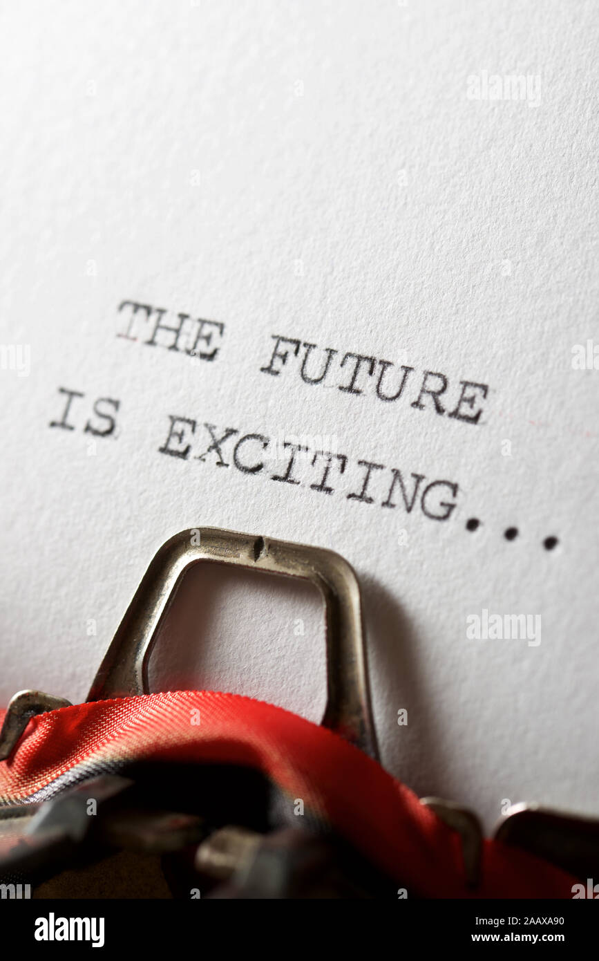 The sentence, The Future is Exciting..., written with a typewriter ...