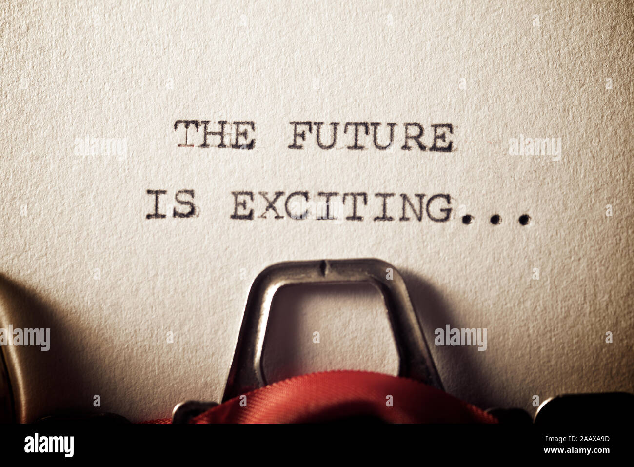 The sentence, The Future is Exciting..., written with a typewriter ...