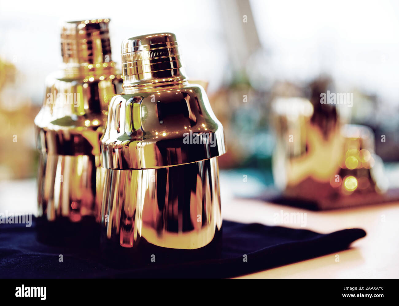 Bartender tools on bar counter, warm light Stock Photo - Alamy