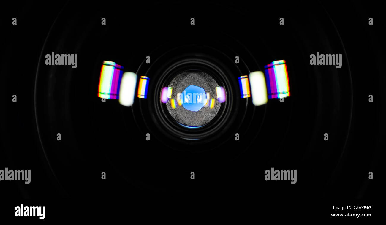 Six-blade aperture photographic lens with colored reflections, close-up ...